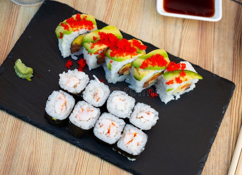 Set of Different Types of Sushi Served on Board Stock Image - Image of ...