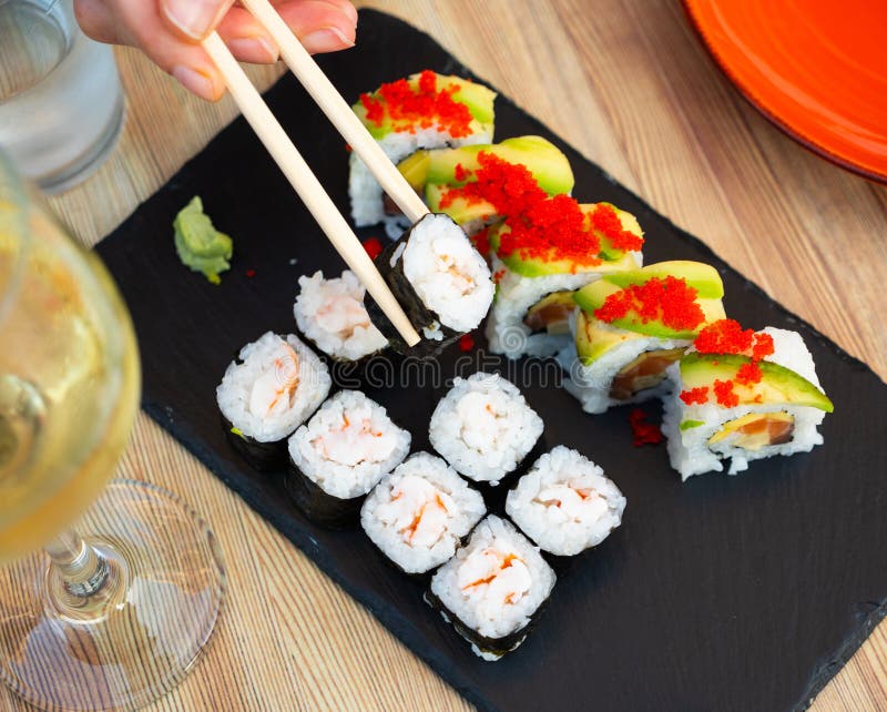 Set of Different Types of Sushi Served on Board Stock Image - Image of ...