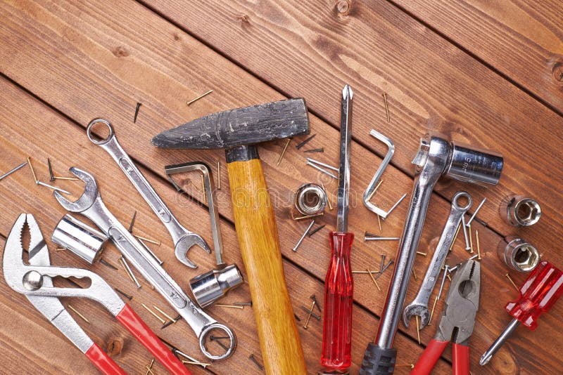 Set of Different Work Tools on Wooden Surface Stock Image - Image of ...