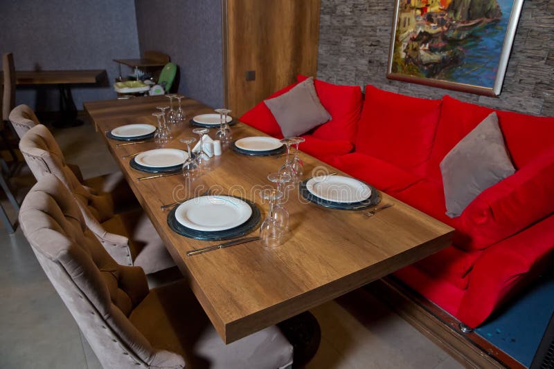 Set of a Dish with Spoon, Fork and Knife on Wooden Table. Empty Table ...