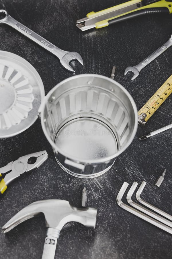 Set of DIY Tools and Garbage Bin in the Centre Stock Image - Image of ...