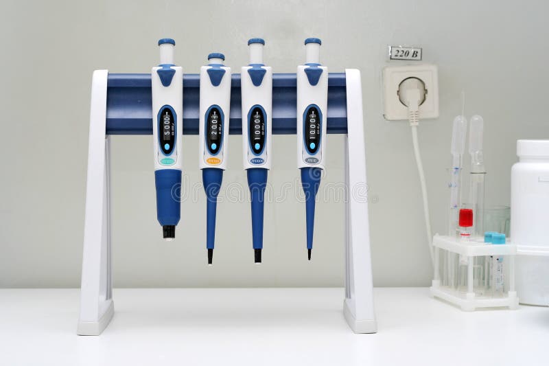 Set of dosers on a support stock photo. Image of research - 11758762