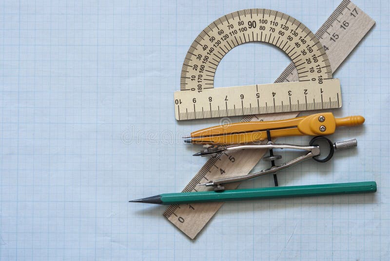 Set of Drawing Instrument and Rulers on Graph Paper Stock Photo - Image ...