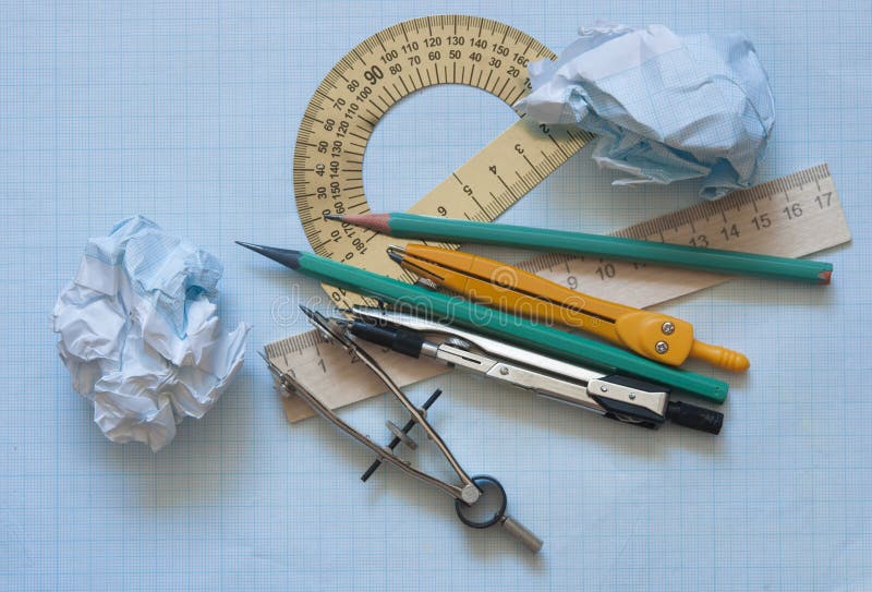 Set of Drawing Instrument and Rulers on Graph Paper Stock Image - Image ...
