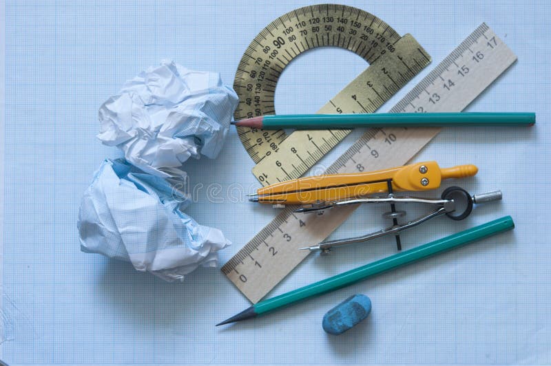 Set of Drawing Instrument and Rulers on Graph Paper Stock Image - Image ...