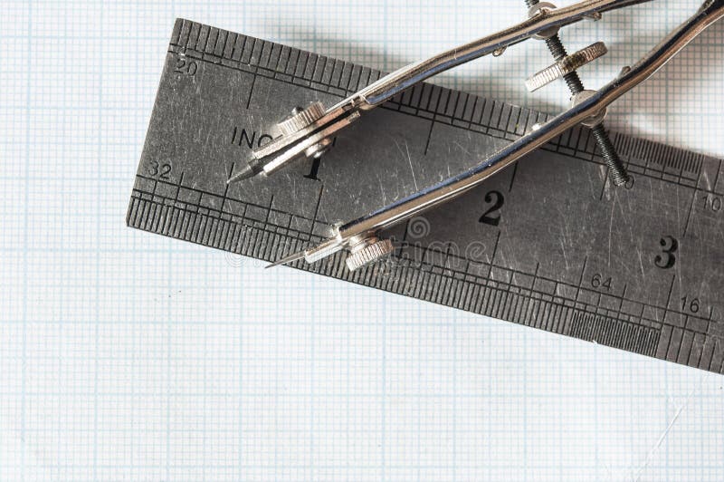 Set of Drawing Instrument and Rulers on Graph Paper Stock Image - Image ...
