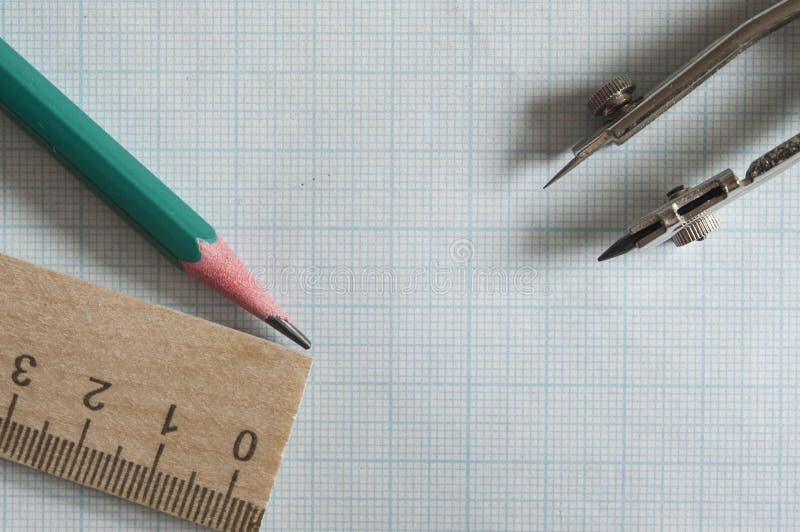 Set of Drawing Instrument and Rulers on Graph Paper Stock Image - Image ...