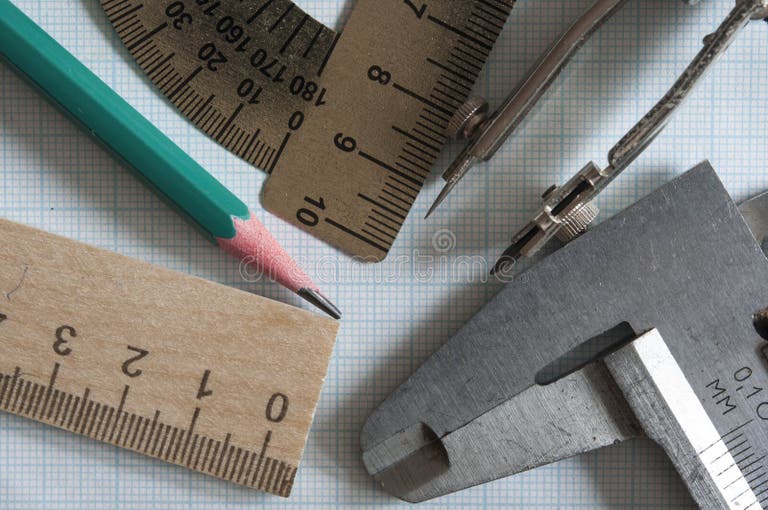 Set of Drawing Instrument and Rulers on Graph Paper Stock Photo - Image ...