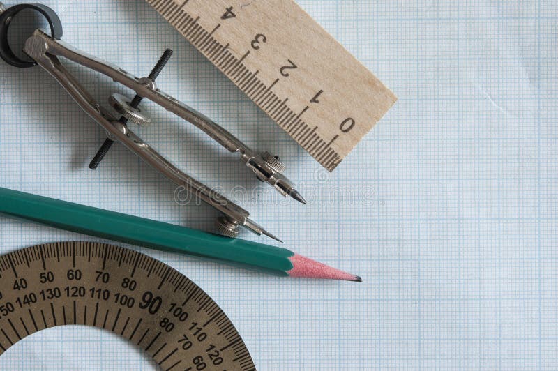 Set of Drawing Instrument and Rulers on Graph Paper Stock Image - Image ...