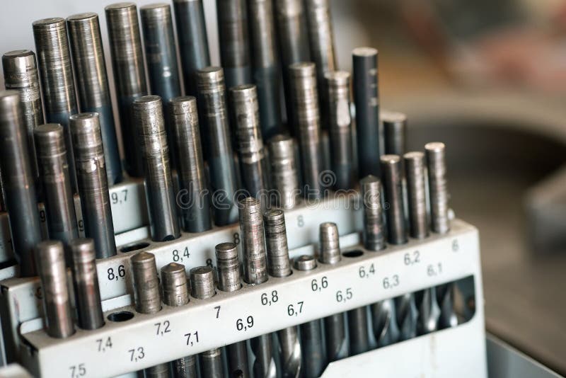 Set of Drill Bits in a Workshop Stock Photo - Image of equipment, tools ...