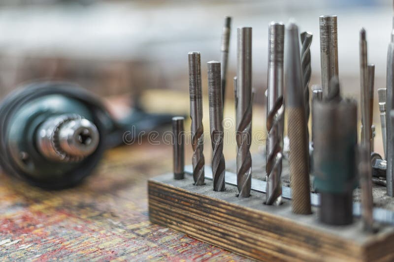 A Set of Drills in the Background of the Drill.the Working Tool of a ...
