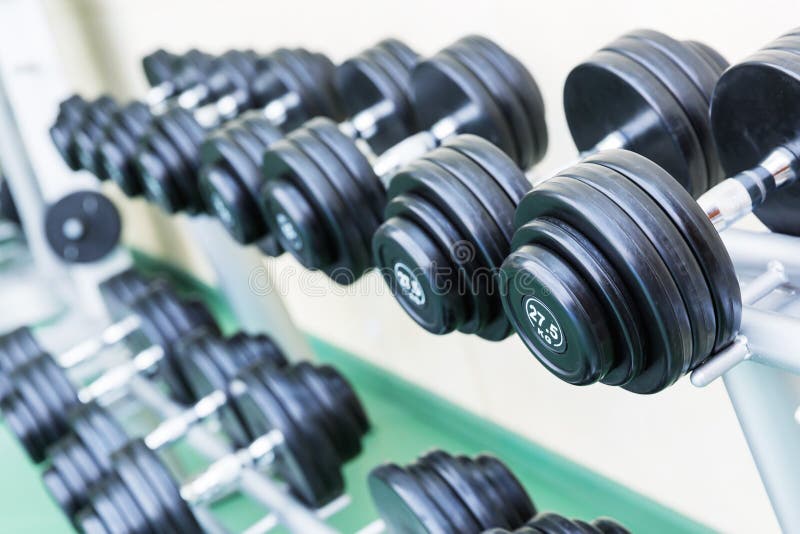Set of dumb-bells stock image. Image of healthy, iron - 55957701