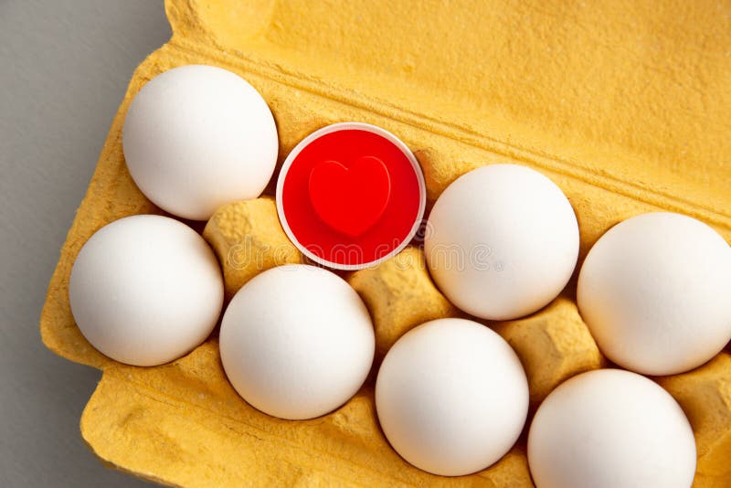 A Set of Eggs One of Which is in the Shape of a Red Heart Stock Photo ...