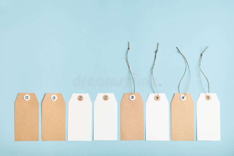 Set of Ten Blank Paper Price Tag with a Knotted String on a Blue Stock ...
