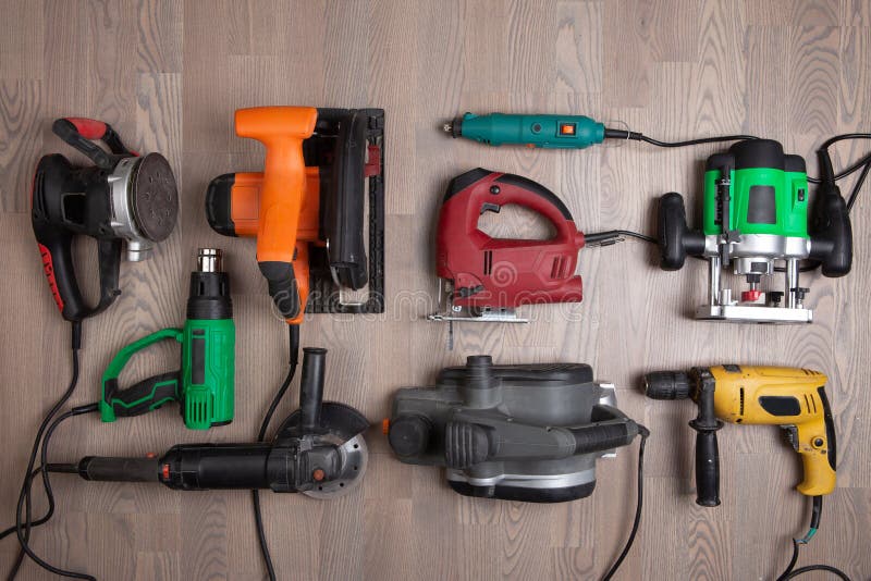 Set of Electric Tools on the Wooden Table. Various Power Tools for ...