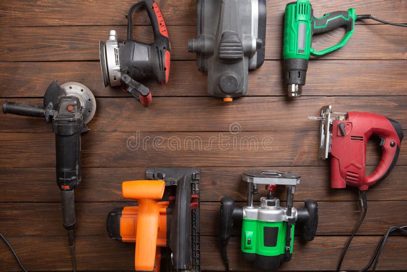 Set of Electric Tools on the Wooden Table. Various Power Tools for ...