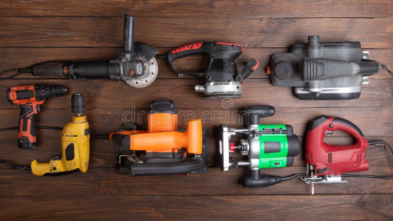 Set of Electric Tools on the Wooden Table. Various Power Tools for ...