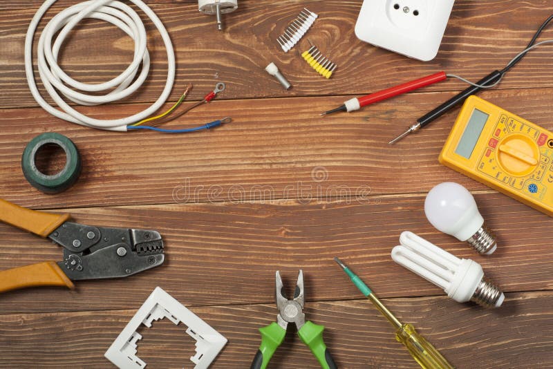 Set of Electrical Tool on Wooden Background. Accessories for ...