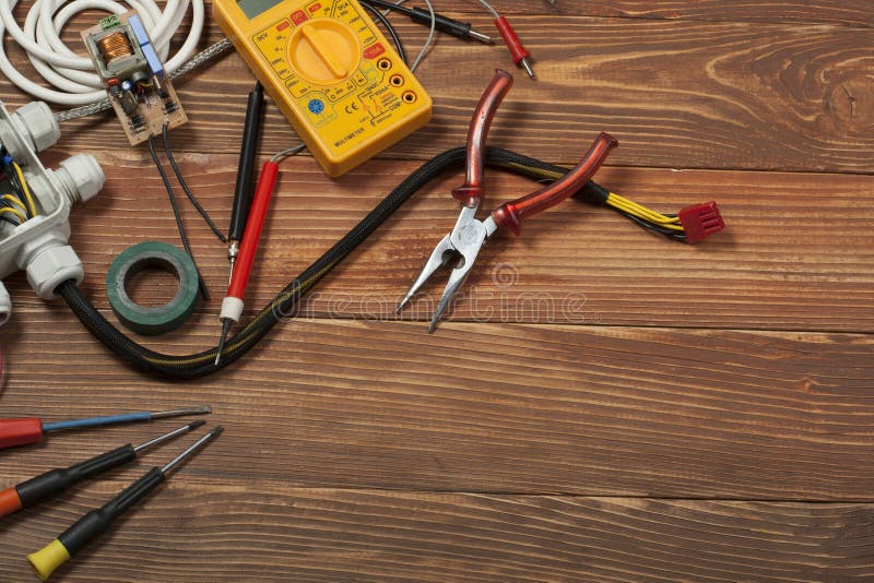 Set of Electrical Tool on Wooden Background. Accessories for ...