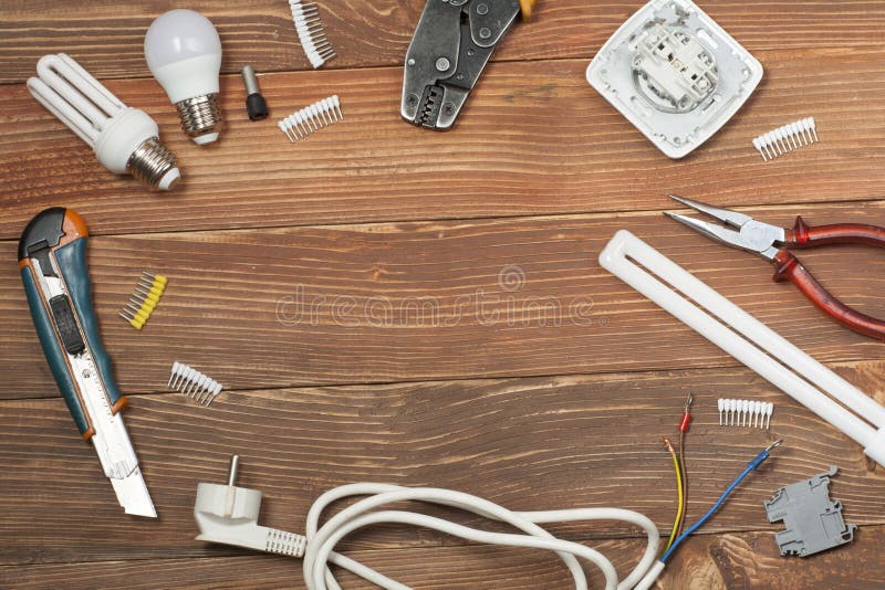 Set of Electrical Tool on Wooden Background. Accessories for ...