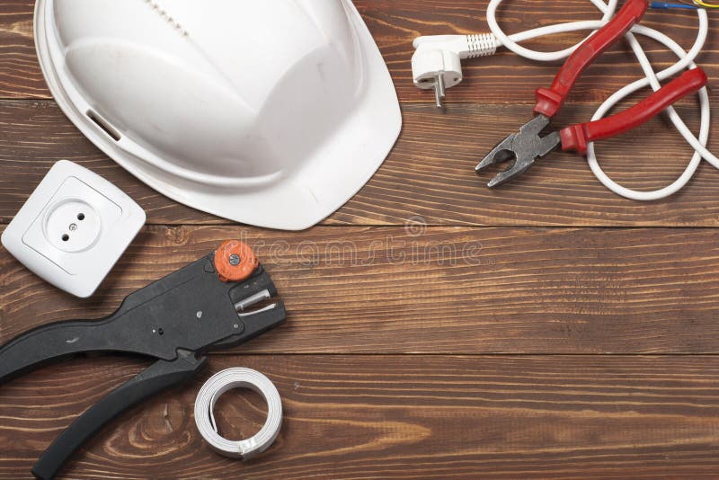 Set of Electrical Tool on Wooden Background. Accessories for ...