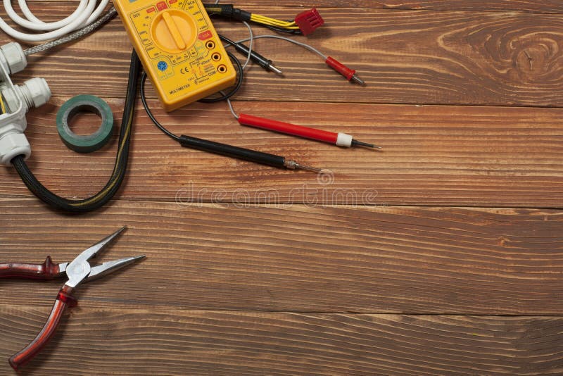 Set of Electrical Tool on Wooden Background. Accessories for ...