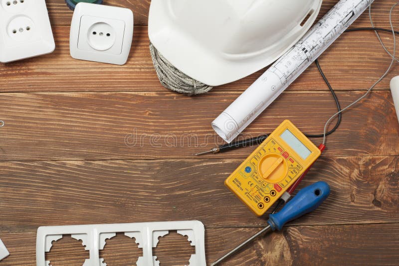 Set of Electrical Tool on Wooden Background. Accessories for ...