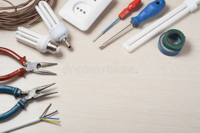 Set of Electrical Tool on Wooden Background. Accessories for ...