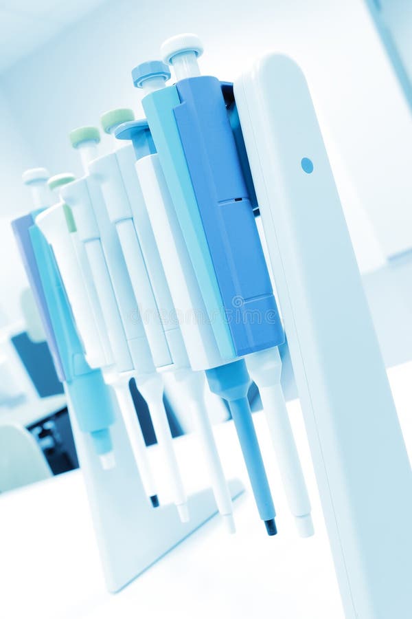 Set of Electronic Droppers in Lab Stock Image - Image of medicine ...