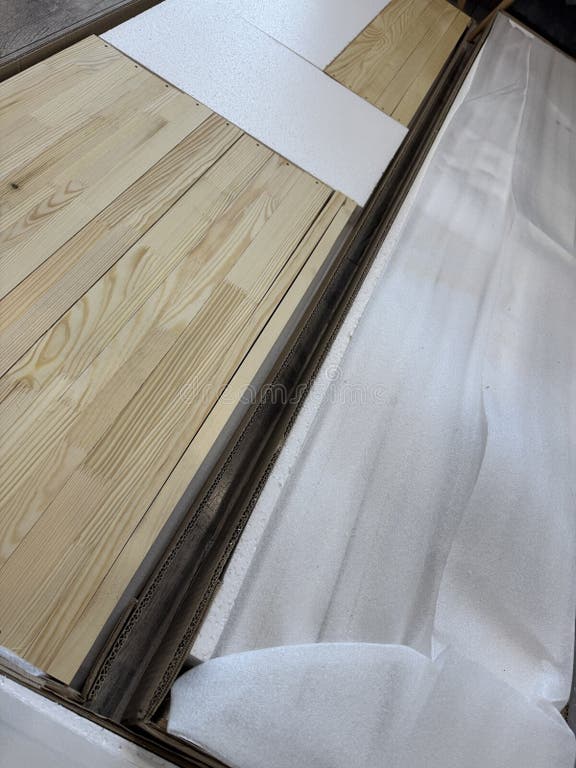 A Set of Elements for Assembling an Ottoman. Wooden Slats in Packaging ...