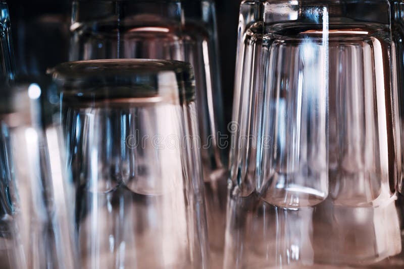 Set of Empty Clean Drinking Glasses on Kitchen Counter Top after ...