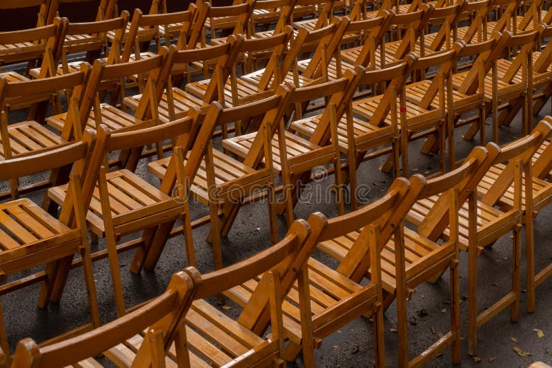 Set of Empty Folding Chairs Lined Up before an Event. Stock Photo ...