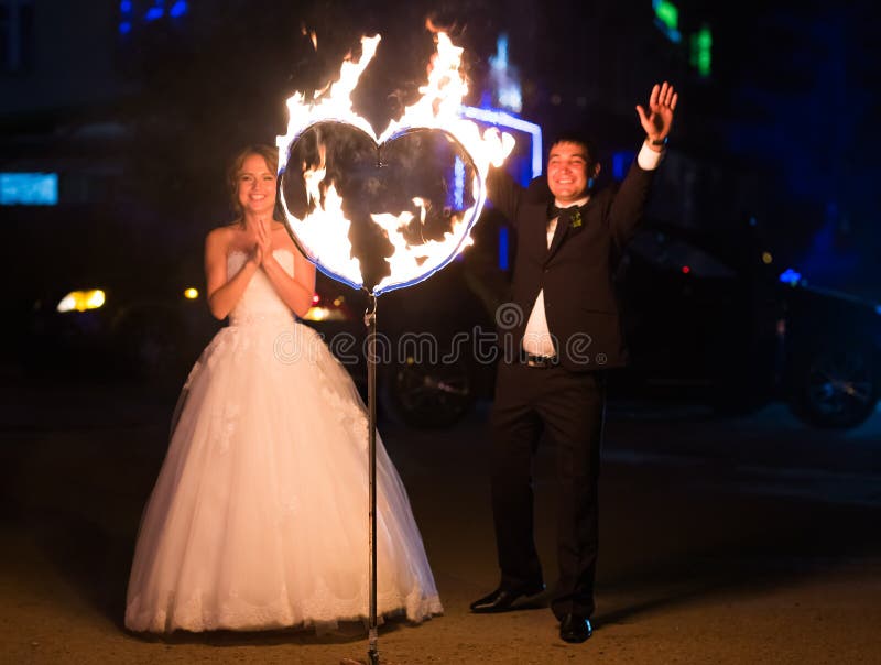 Set Fire To the Couple on Their Wedding Heart Stock Photo - Image of ...