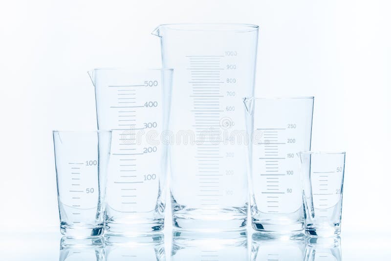 Beakers of Different Size with Green Liquid. Copy Space. Stock Photo ...