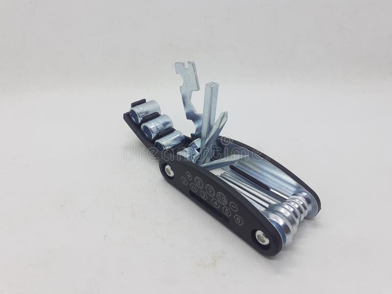 A Set of Foldable Wrench and Screwdriver on White Isolation Background ...