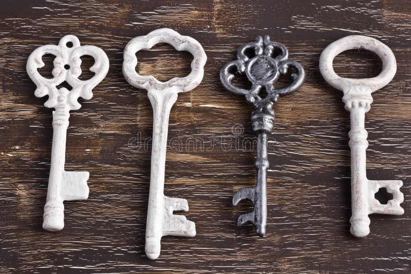 Set of Four Antique Keys, One Being Different Stock Photo - Image of ...
