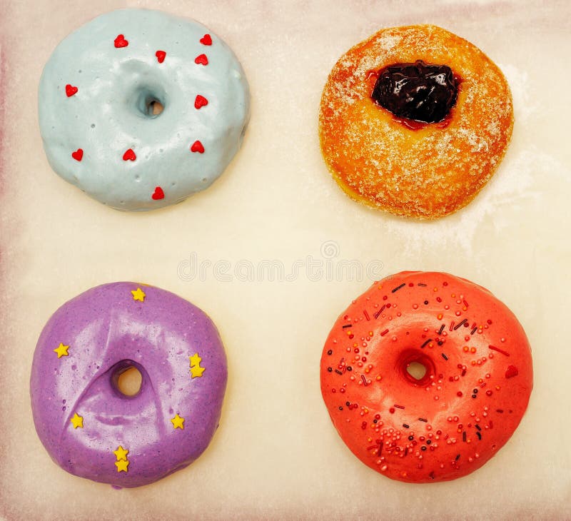 Set of Four Donuts. Colored Delicacies Stock Photo - Image of candy ...