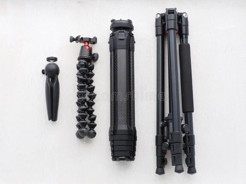 Set of Four Photographs Tripods Different Size. Stock Image - Image of ...