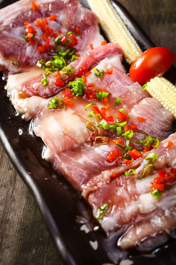 Set of Fresh Pork Chops with Roasted Baby Corn Stock Image - Image of ...