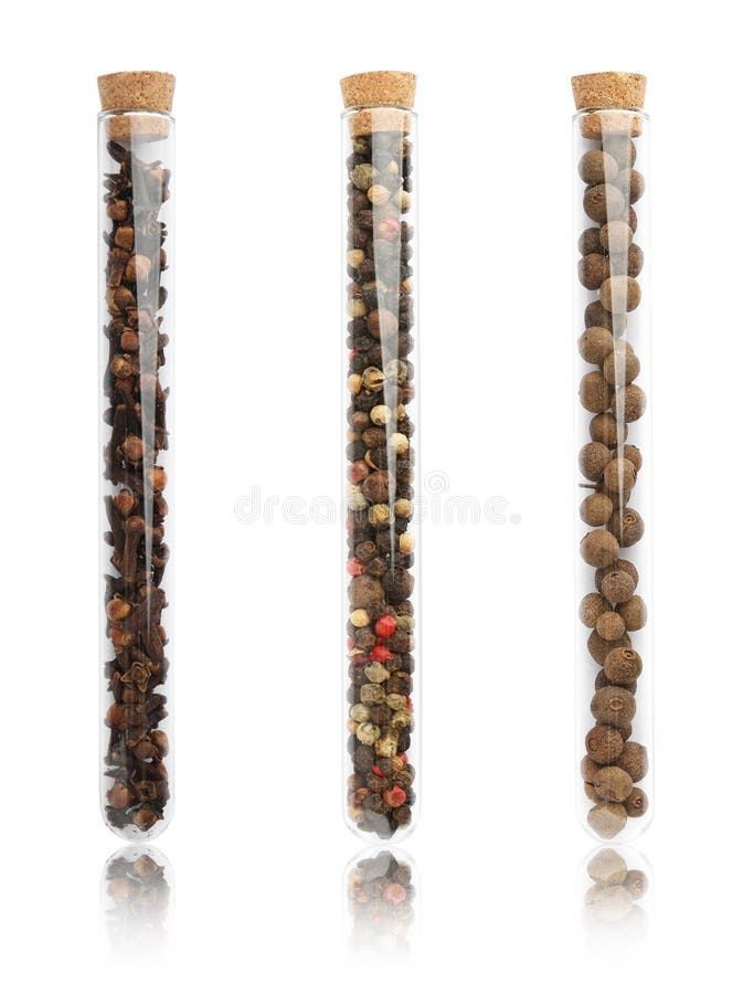 Set of Glass Tubes with Different Spices on White Background Stock ...