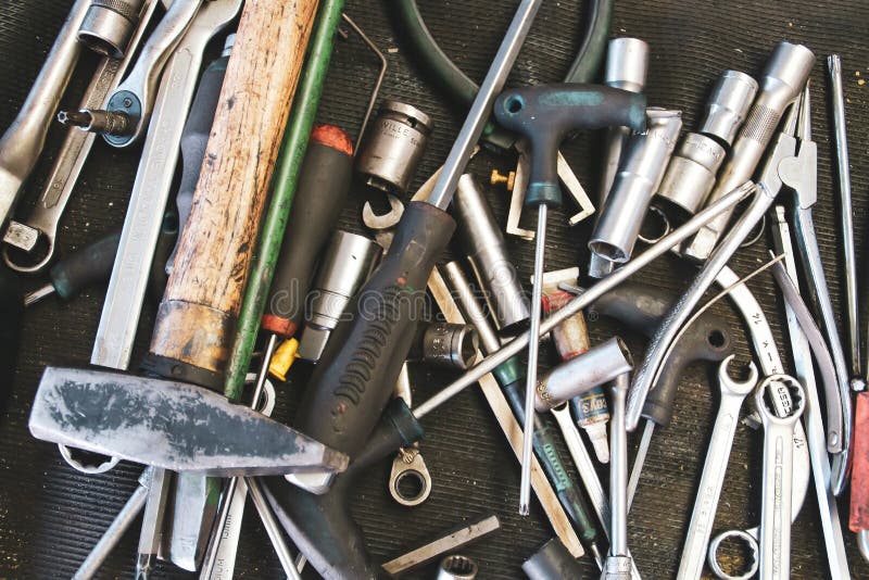 Set of Greasy Tools from a Mechanical Workshop. Editorial Stock Image ...