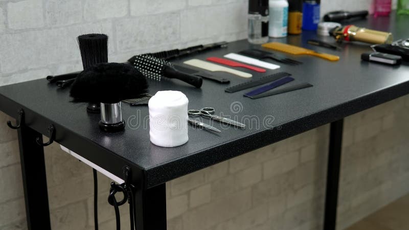 A Set of Hairdressing Tools and Styling Products on a Table in a ...