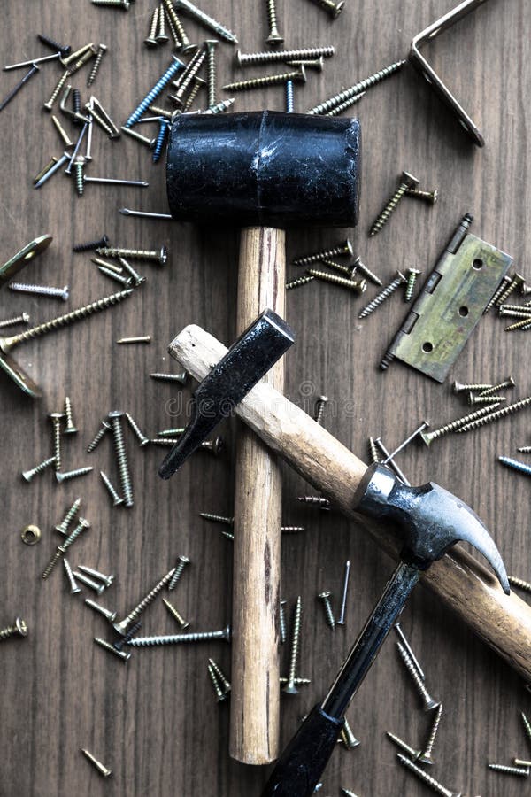 A Set of Hammers with Some Nails and Screws Stock Photo - Image of hand ...