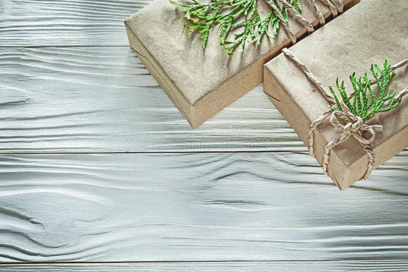 Set of Handmade Present Boxes with Green Branches on Wooden Boar Stock ...