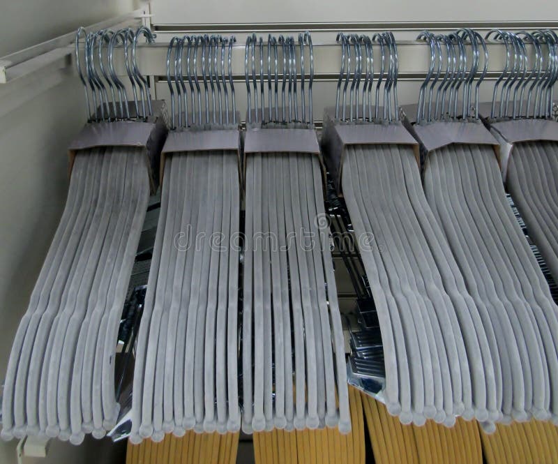 Set of Velvet Hangers on Closet Rack Stock Photo - Image of cloth ...