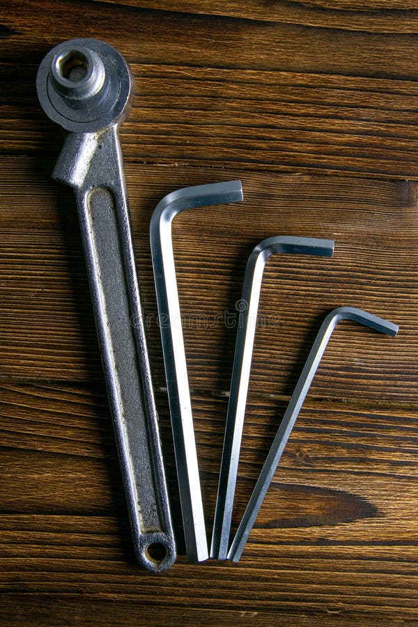 Set of Hexagonal Keys on a Wooden Table. Top View Stock Photo - Image ...