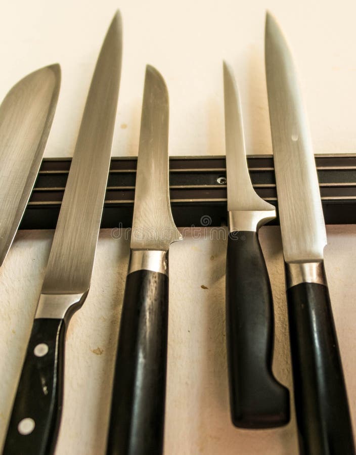 Set of High Quality Kitchen Cook Knives Tools on a Magnet Board Hanging ...