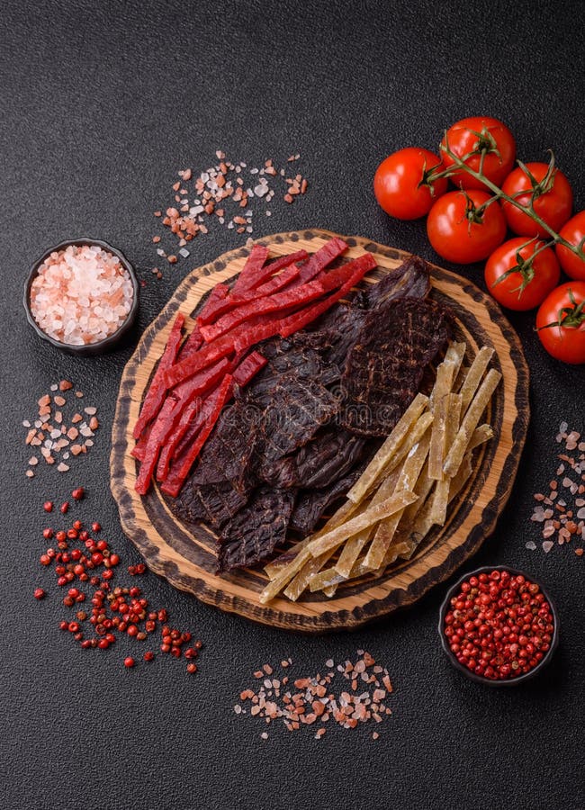 A Set of Jerky or Snacks of Beef, Chicken and Fish with Salt and Spices ...