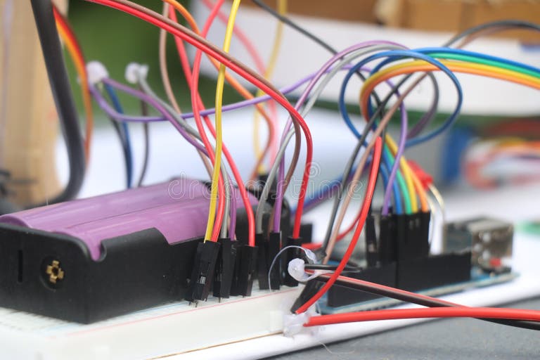 Set of Jumper Cables Connected To Micro Controller and Breadboard with ...