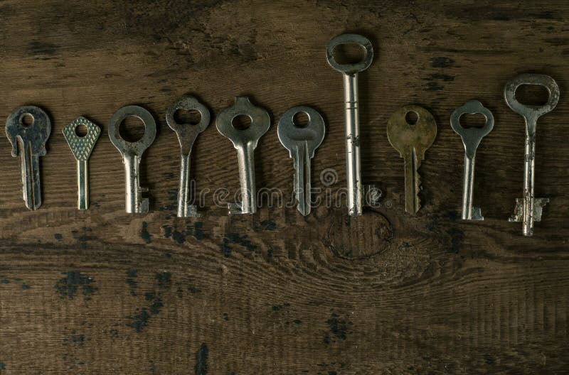 Set of Keys on Wood Background Stock Image - Image of secure, steel ...